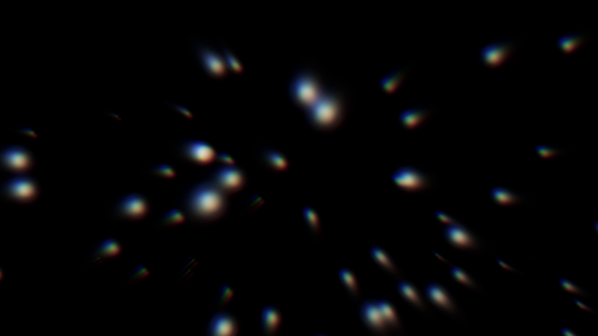 Bright Particles Bounce - Black Background — Free Stock Footage Archive